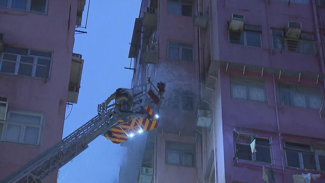 Seven people were injured in a house fire on Tong Mi Road, one of whom ...